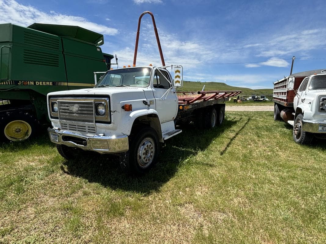 1980 Chevrolet 70 truck, w/ 26’ bale rack that holds 15 bales Other ...