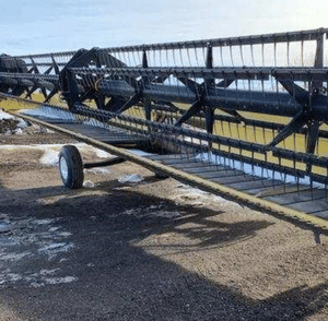 SOLD - 2010 New Holland 94C Harvesting with 42 ft | Tractor Zoom