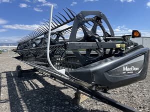 SOLD - 2013 MacDon D65 Harvesting with 25 ft | Tractor Zoom