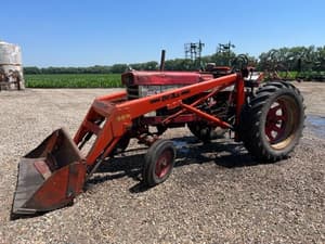 SOLD - International Farmall 460 wide front w/ Dual 325 front grapple ...