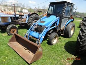 SOLD - New Holland TC45 4wd Tractor w/ 16LA Loader, Curtis Cab, Gear ...
