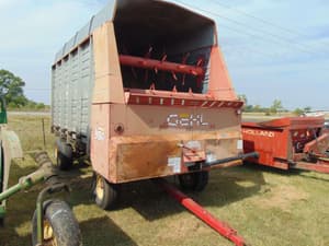 SOLD - GEHL 980 FORAGE BOX, 16 FT STEEL SIDES ON GEHL TANDEM AXLE 6 ...