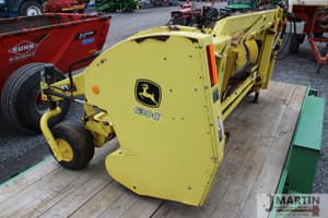 SOLD - John Deere 630C Lot No. 9899 Harvesting with 9 ft | Tractor Zoom