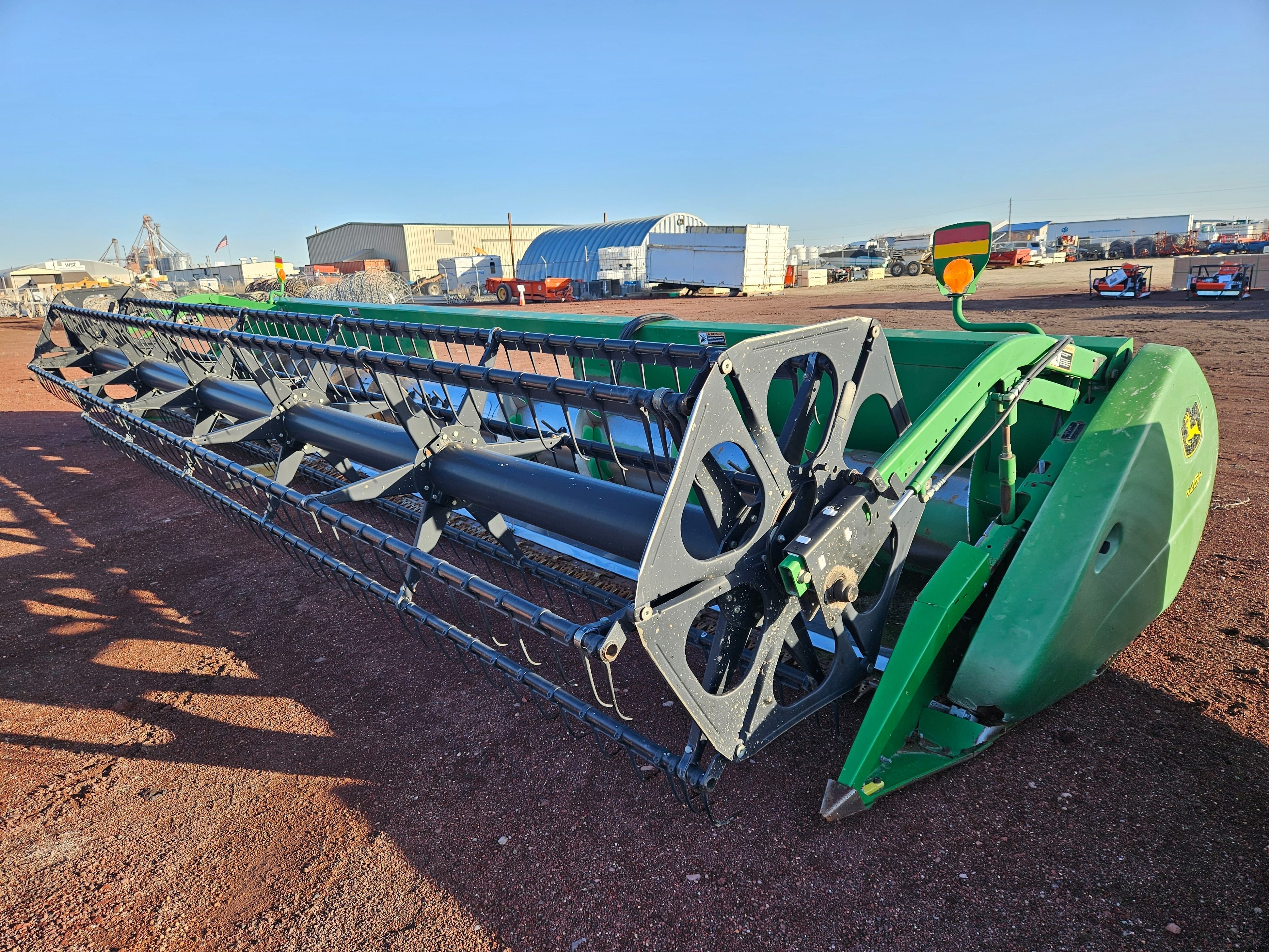 SOLD - John Deere 625 Harvesting with 25 ft | Tractor Zoom