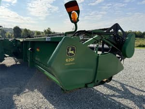 SOLD - John Deere 630F Lot No. 6202 Harvesting with 30 ft | Tractor Zoom