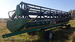 SOLD - John Deere 630F Lot No. EB9795 Harvesting with 30 ft | Tractor Zoom