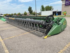 SOLD - John Deere 630F Lot No. 243 Harvesting with 30 ft | Tractor Zoom