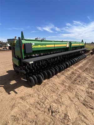 SOLD - CrustBuster 6025 Lot No. 232743985 Planting with 26 ft | Tractor ...
