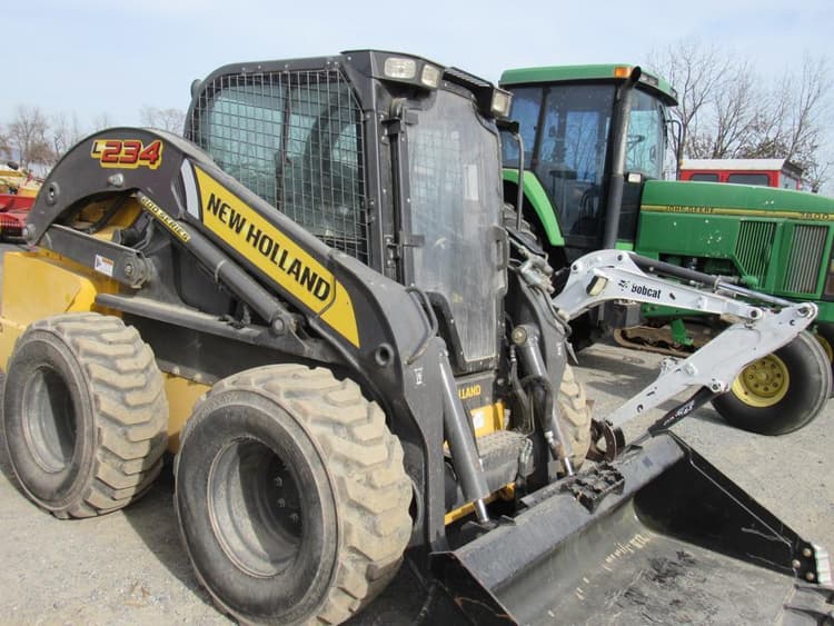 SOLD - New Holland L234 Construction Skid Steers | Tractor Zoom
