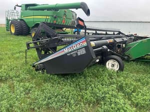 SOLD - MacDon 962 Lot No. 66 Harvesting with 36 ft | Tractor Zoom