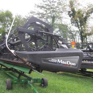 SOLD - 2009 MacDon FD70 Harvesting with 40 ft | Tractor Zoom