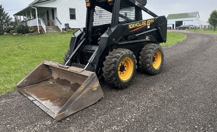 SOLD - New Holland LS180 Construction Skid Steers | Tractor Zoom