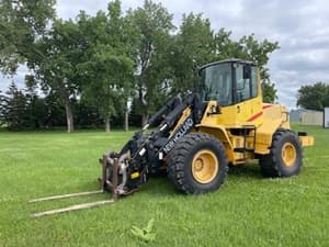 SOLD - New Holland W130 Lot No. 125 Construction with 9,074 Hrs ...